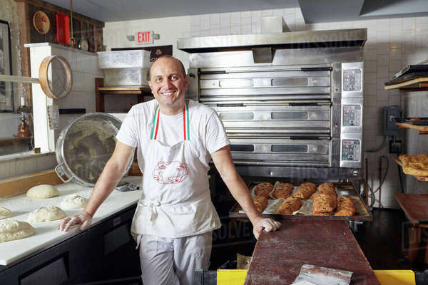 Portrait of baker in bakery - Royalty-free Stock Photo | Dissolve