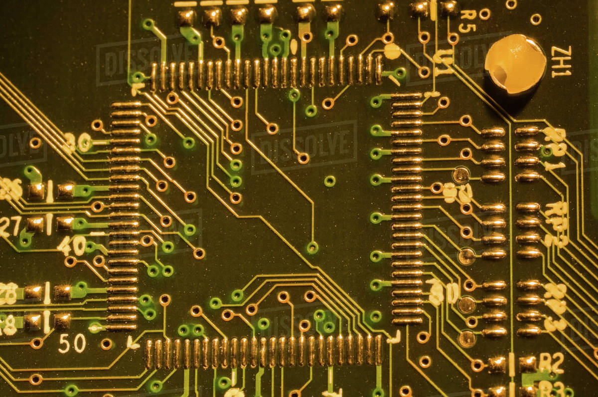 Close up of computer circuit board - Stock Photo - Dissolve