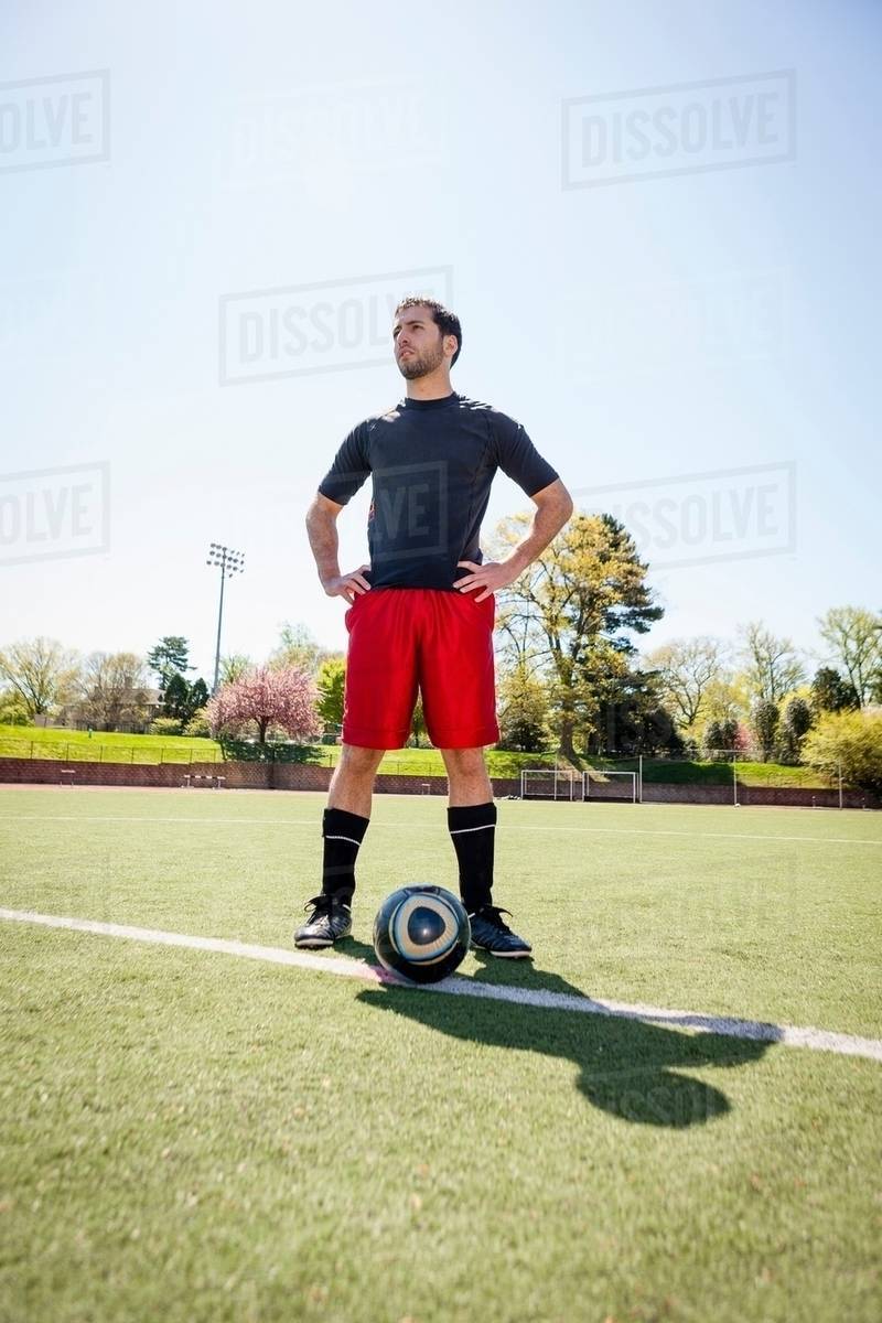 Soccer player waiting to start play - Royalty-free Stock Photo | Dissolve