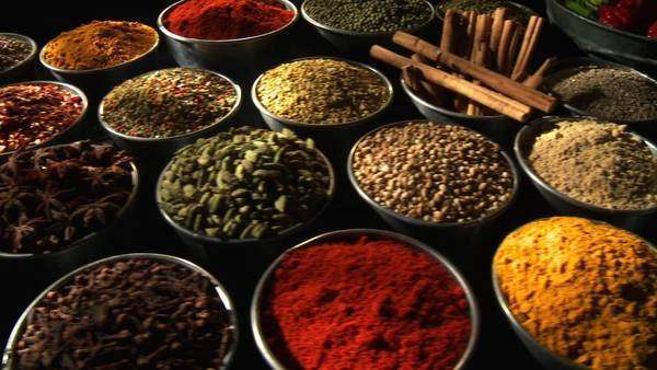 Assorted spices in small containers - Stock Video Footage - Dissolve