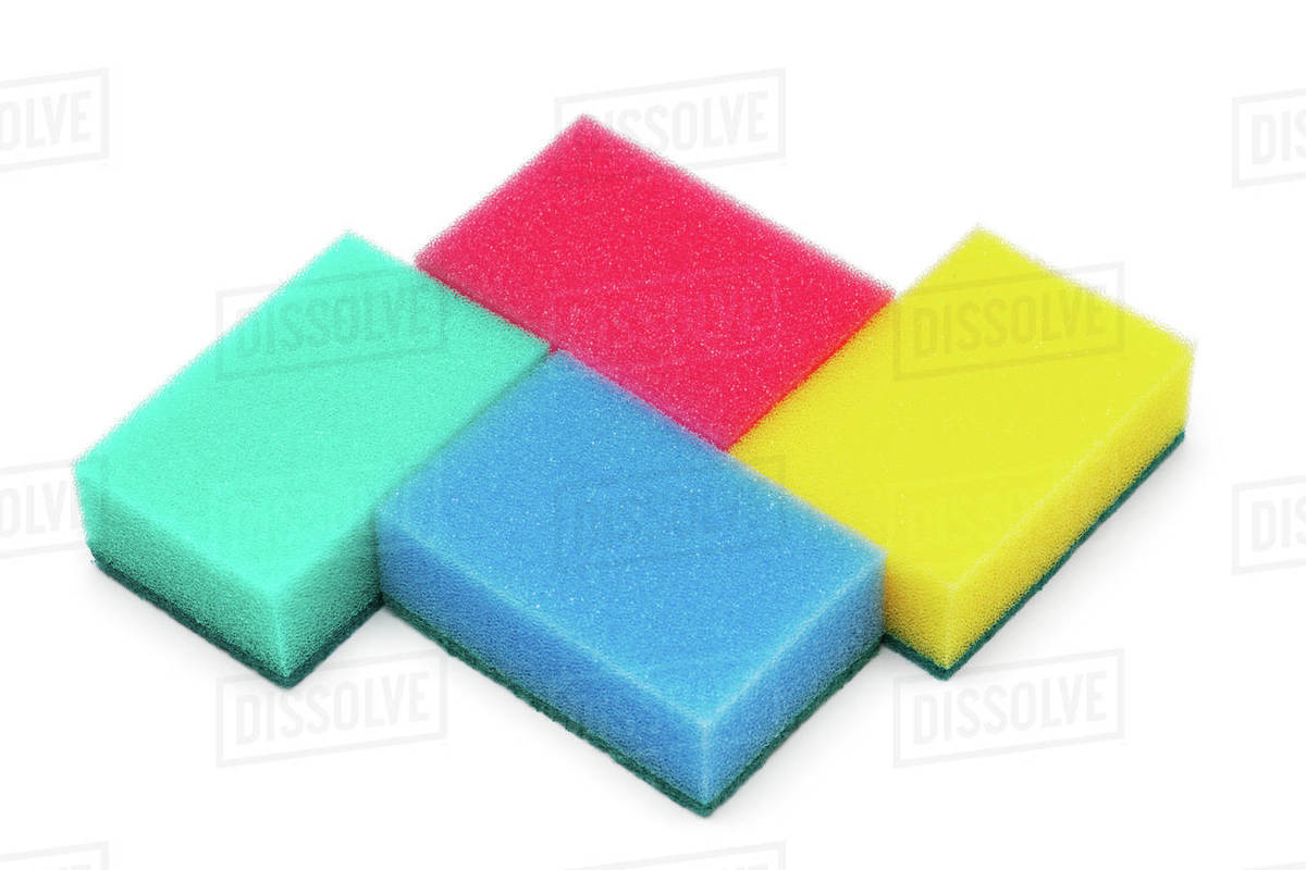 Group of rectangular foam sponges of blue, green, yellow and pink ...