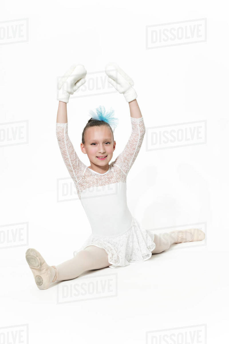Smiling girl ballet dancer nine-year-old in white ballet tutu skirt ...