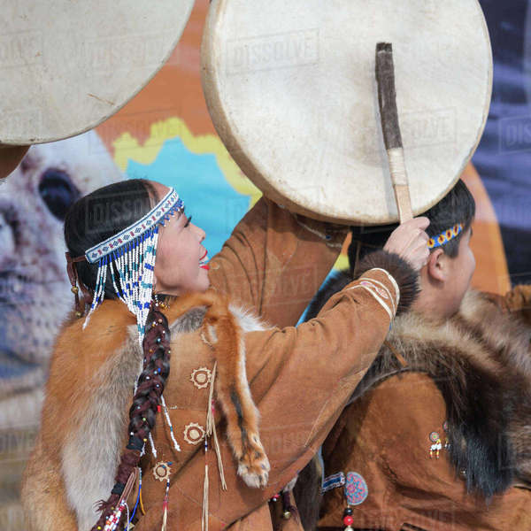 Female dancing with tambourine in tradition clothing indigenous ...