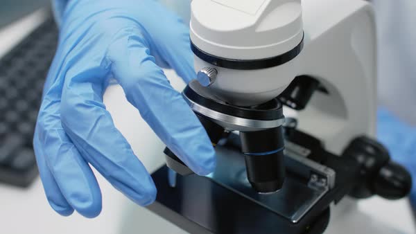 Close up of scientific microscope sample tray in laboratory used by ...