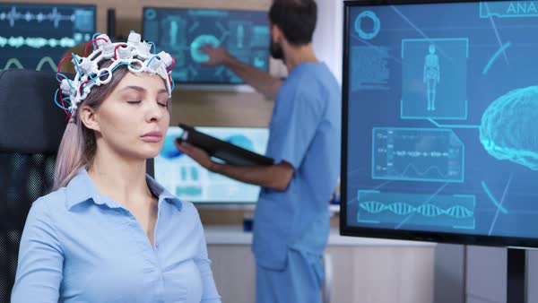 Brain activity on tv screen from female patient with brainwaves ...
