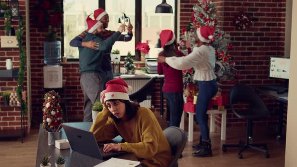 Angry frustrated person being interrupted by noisy people celebrating ...