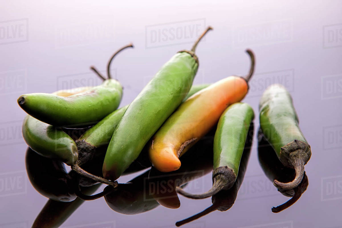A close up studio image of a bunch of jalapeno peppers. - Royalty-free ...