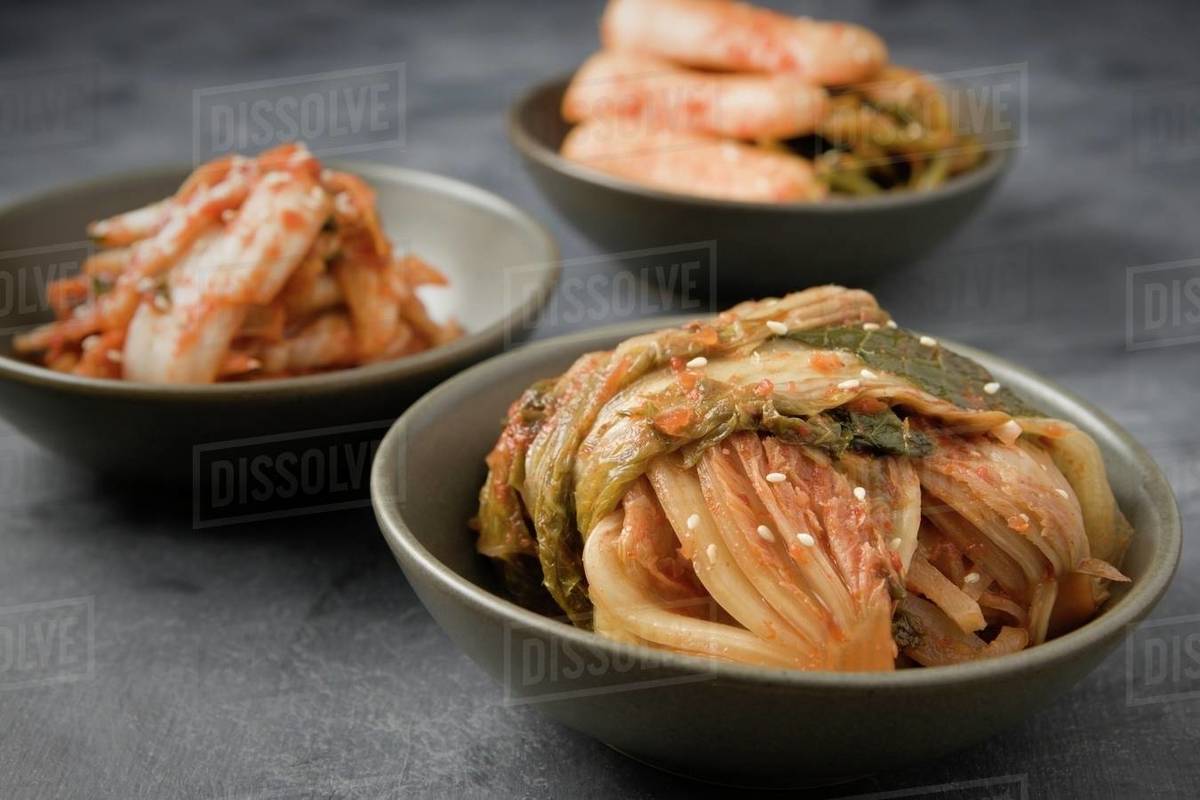 A close up of various home made Korean Kimchi in bowls - Royalty-free ...