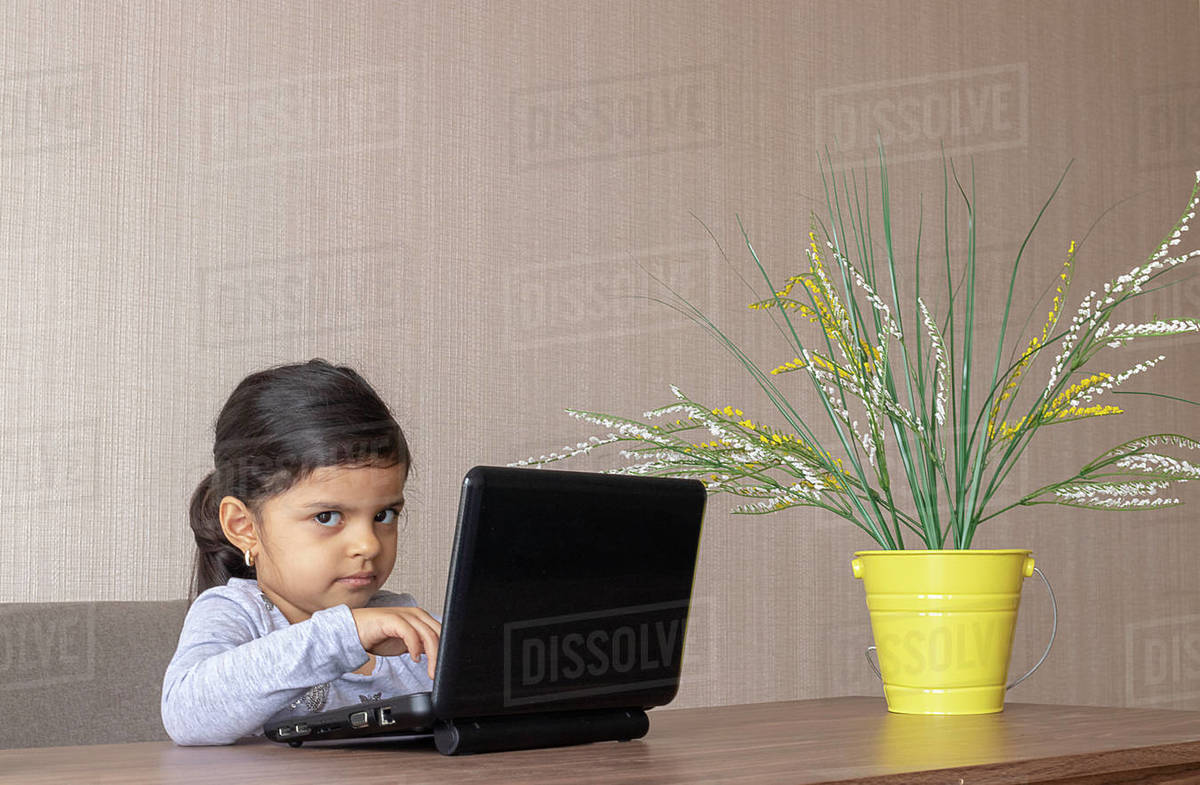 Cute little girl working in the office - Royalty-free Stock Photo ...