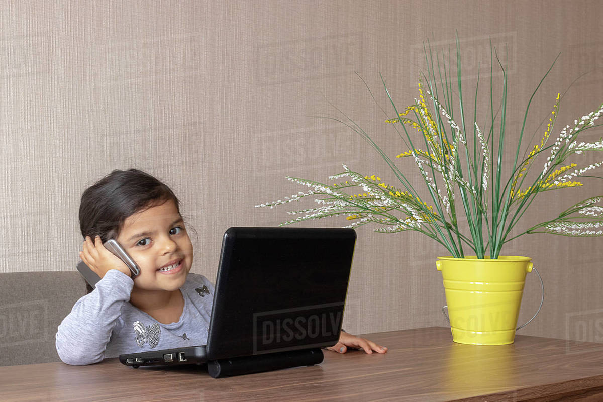 Cute little girl working in the office - Royalty-free Stock Photo ...