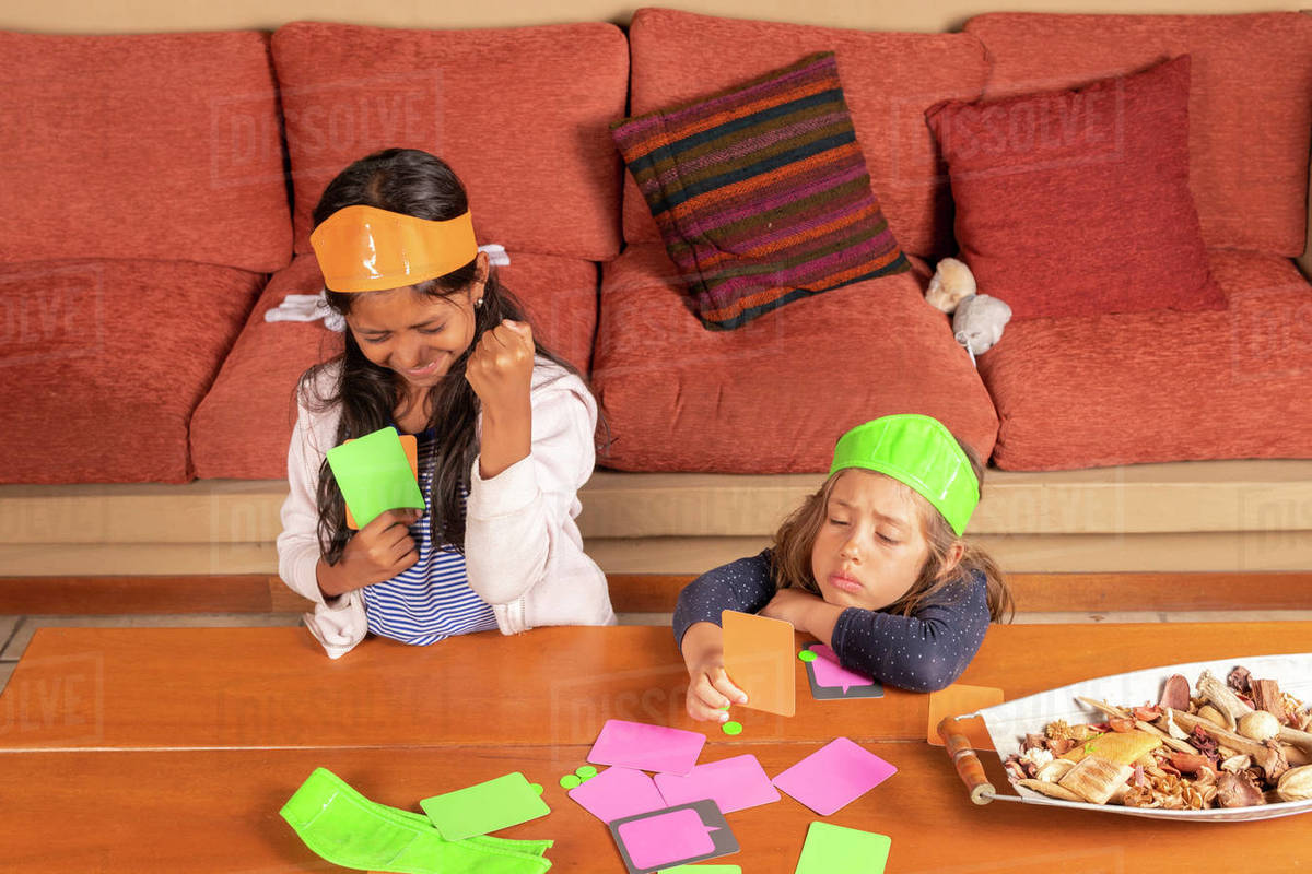 Girl celebrates after winning her card game - Royalty-free Stock Photo ...