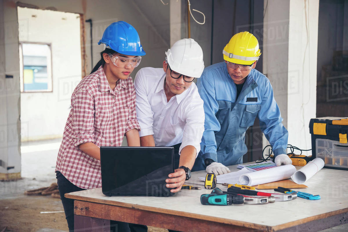 Construction engineer teamwork Safety Suit Trust Team Holding White ...