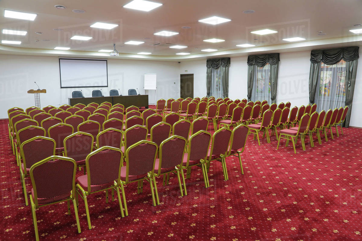 Prepared conference room for guests, with red carpet, clean, cozy ...