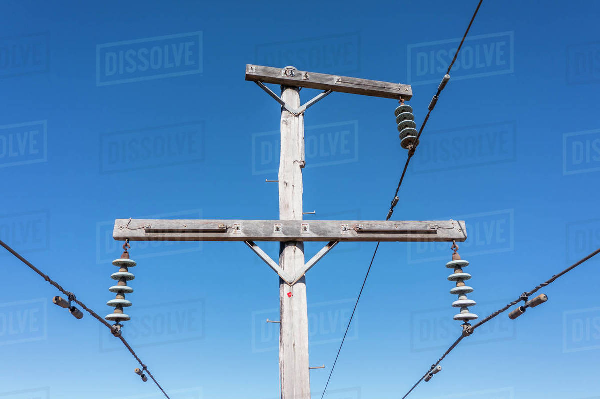 A telephone pole and wires in a forest affected by bushfires - Royalty ...