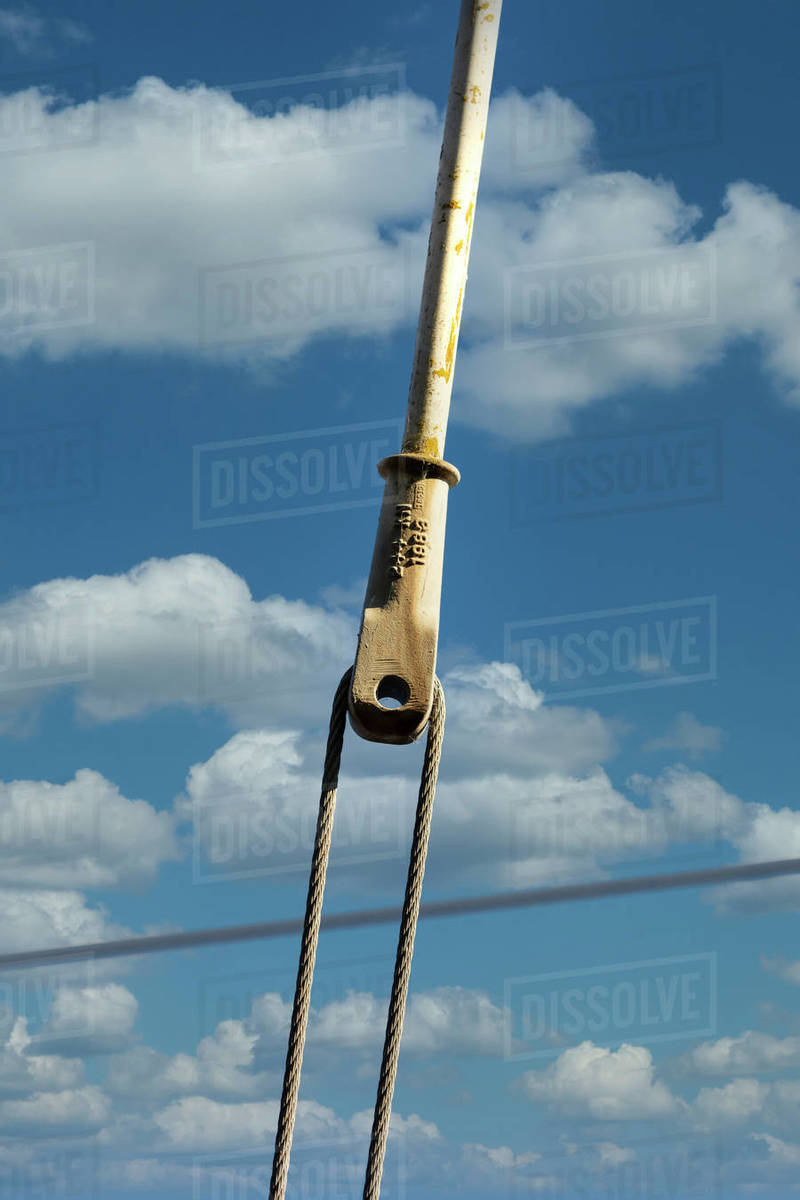 A tensioner bracket on a transmission line - Stock Photo - Dissolve