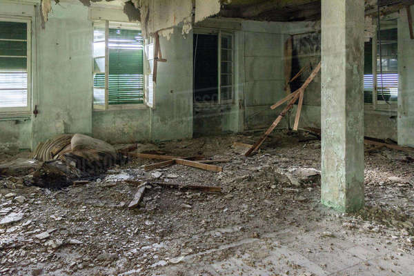 Old abandoned destroyed room in Italy colony - Stock Photo - Dissolve