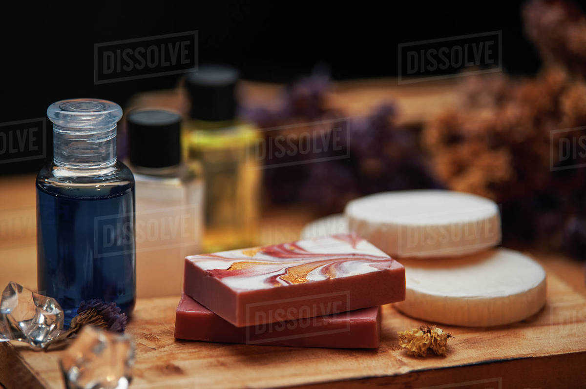 Shampoo and soap products on wooden board - Royalty-free Stock Photo ...