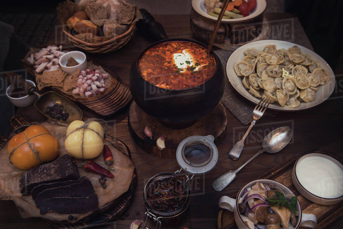 Russian food: borsch pickles cheese meat dumplings and fat - Royalty ...