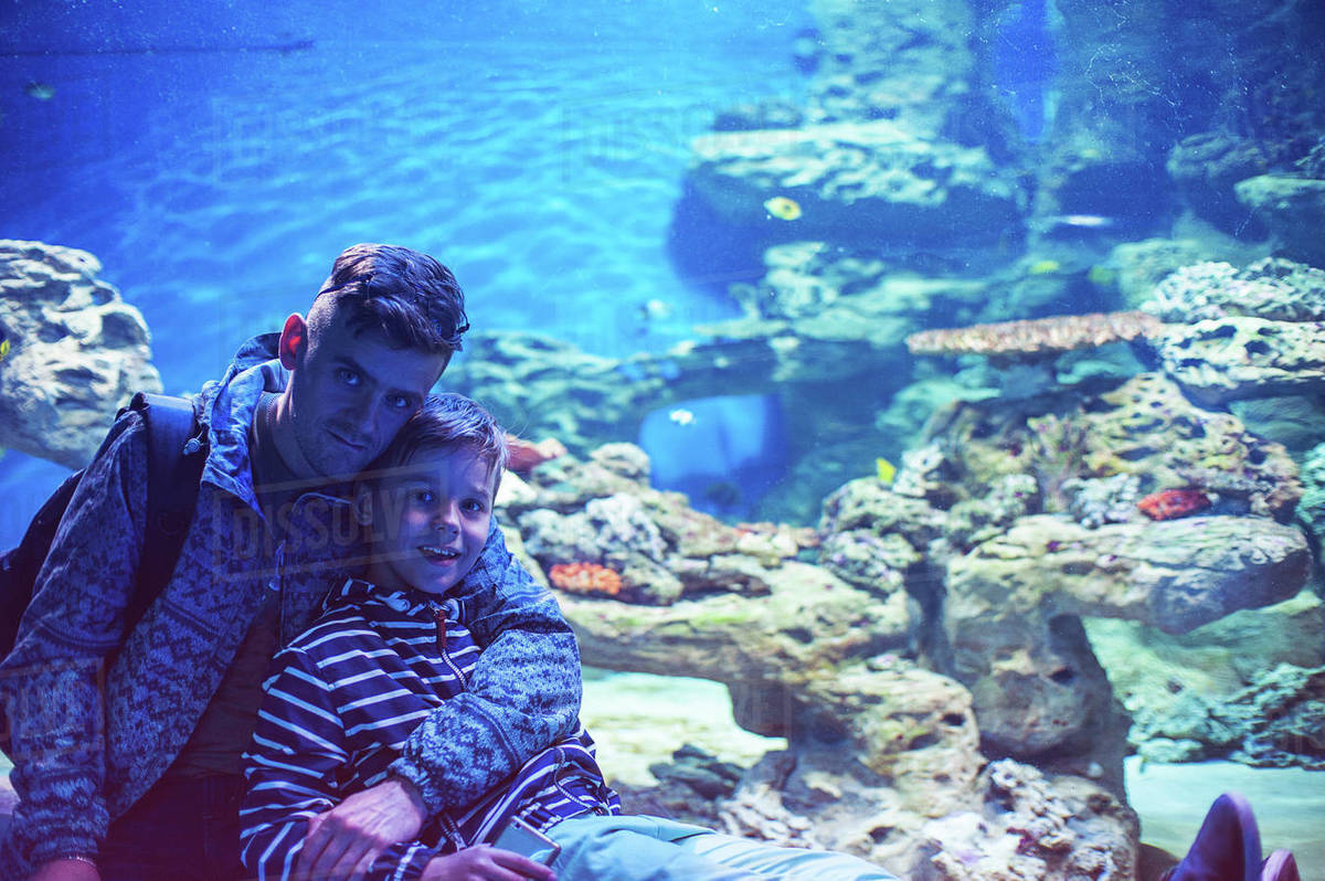 Photo of man with son in the oceanarium - Royalty-free Stock Photo ...