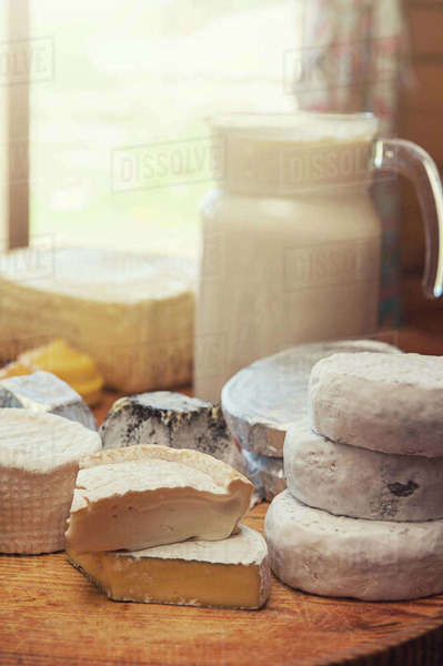 Set of different cheese: camembert, croton, mozzarella, smoked ...