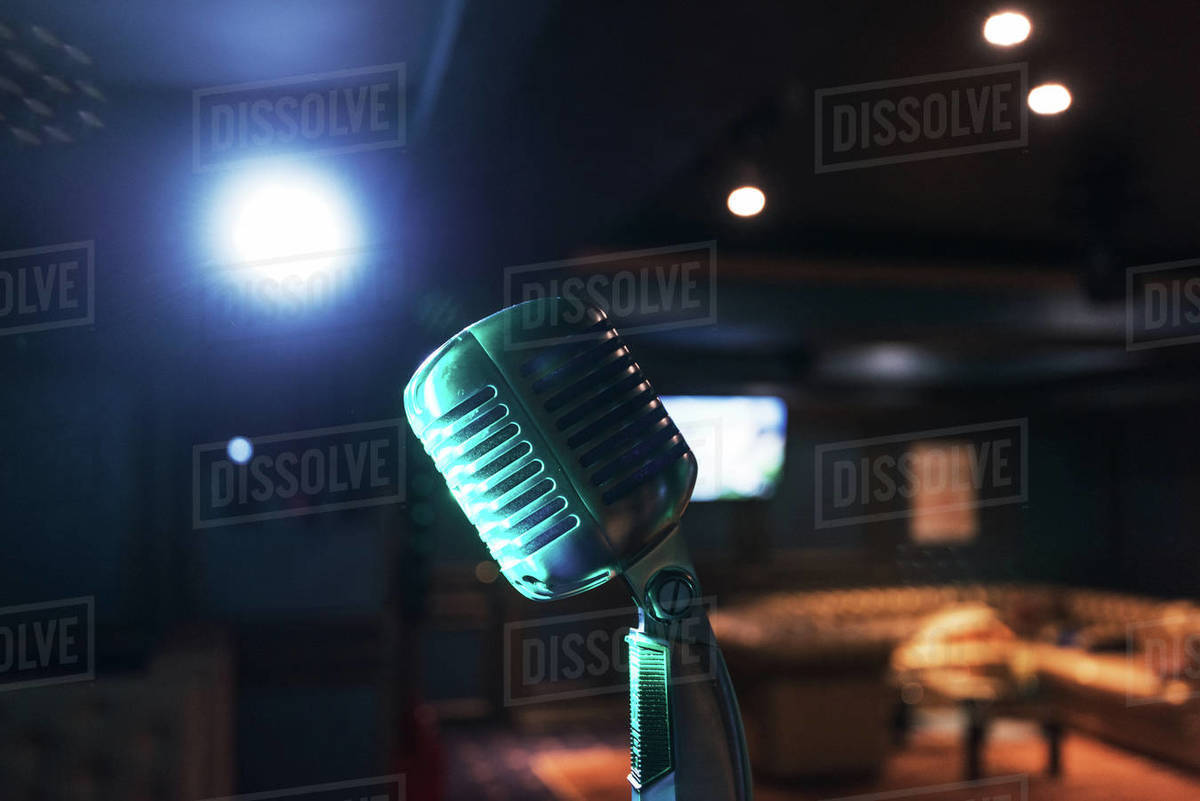 Retro music microphone on stage in a night club. Show or performance ...