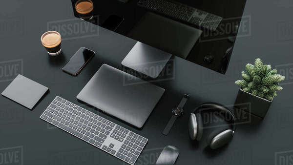 Top view on workplace with gadgets - Royalty-free Stock Photo | Dissolve