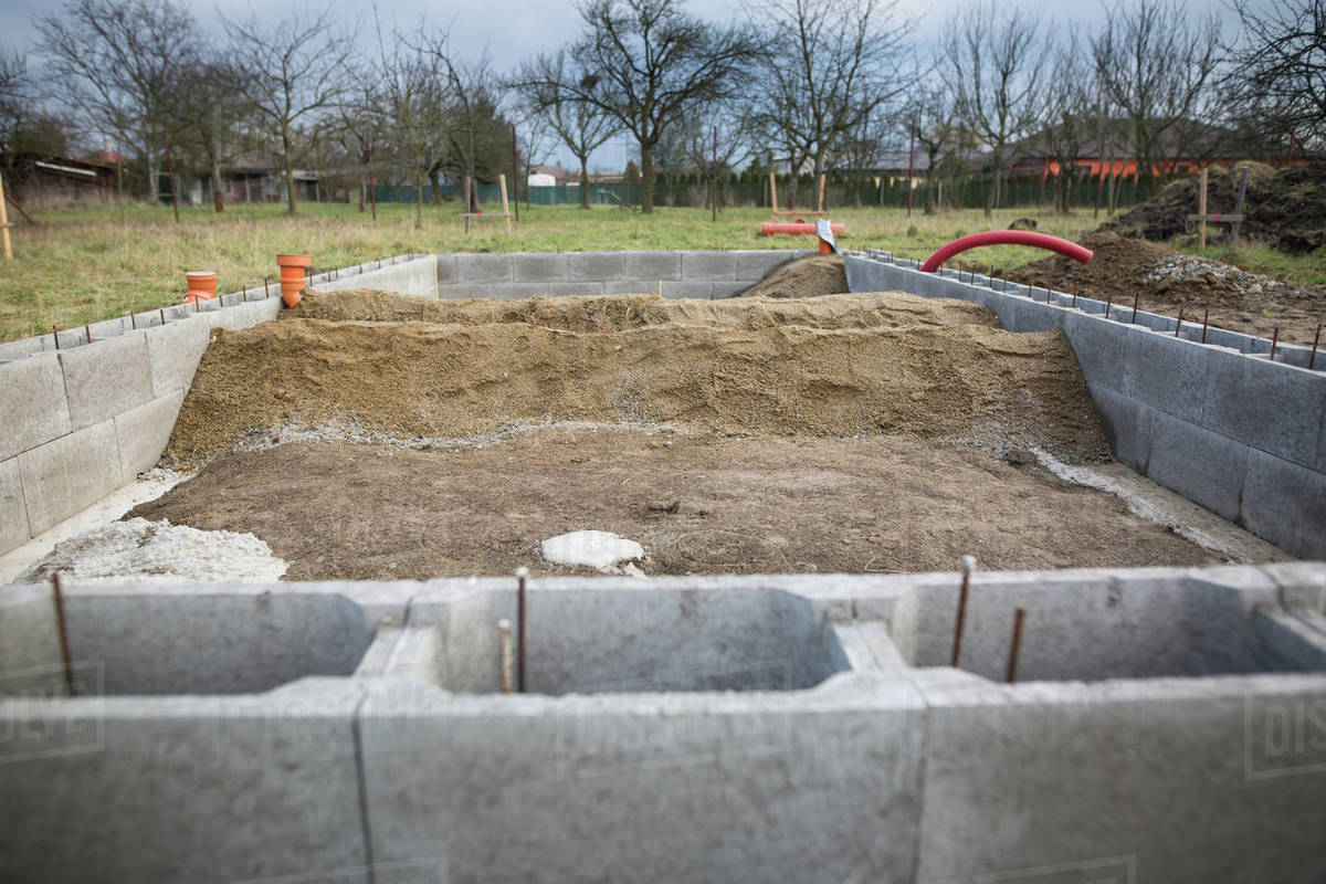 Foundations of the house, unfinished bungalow, rough construction ...