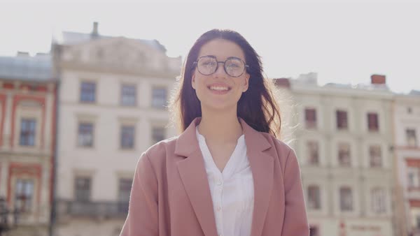 Woman face. Low angle portrait of gorgeous girl with beautiful hair ...