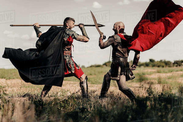 Battle with spear and sword between two ancient greek or roman warriors ...