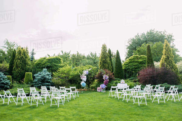 Wedding ceremony in the landscaping garden among lawn - Royalty-free ...