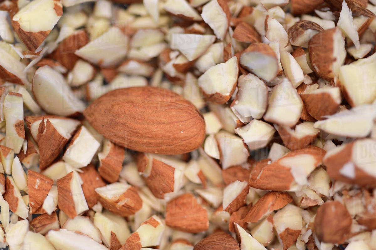 Chopped almonds abstract background and texture. - Stock Photo - Dissolve