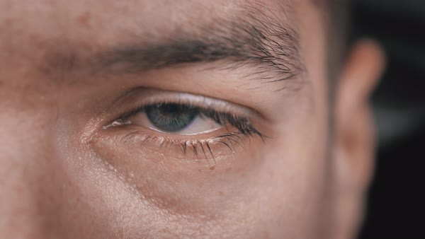 Close-up shot of crying man with tears in eye. - 4K Royalty-free Stock ...