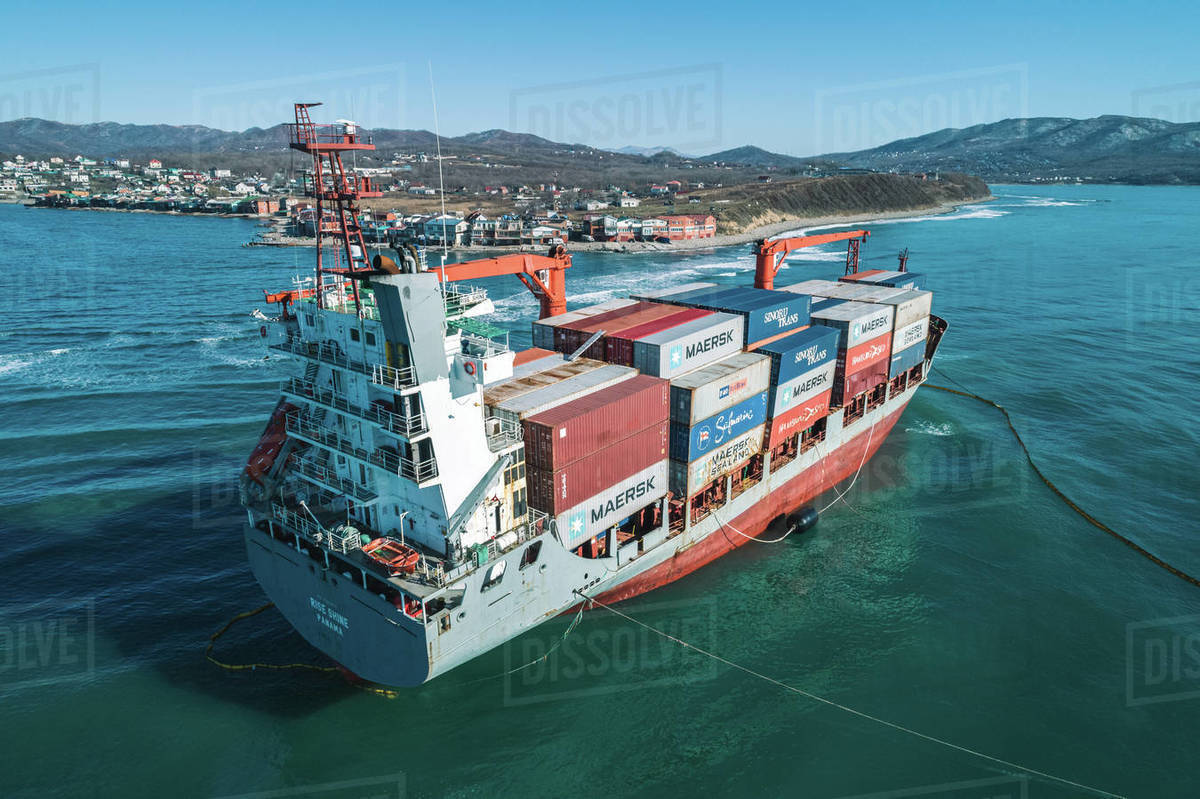 Aerial view of a RISE SHINE container cargo ship stands aground after a ...