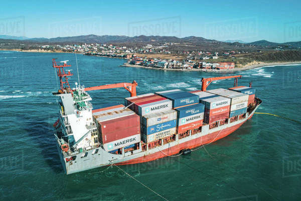 Aerial view of a RISE SHINE container cargo ship stands aground after a ...