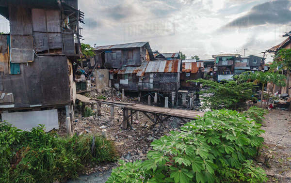 Life amidst challenges in a philippine slum community surrounded by ...