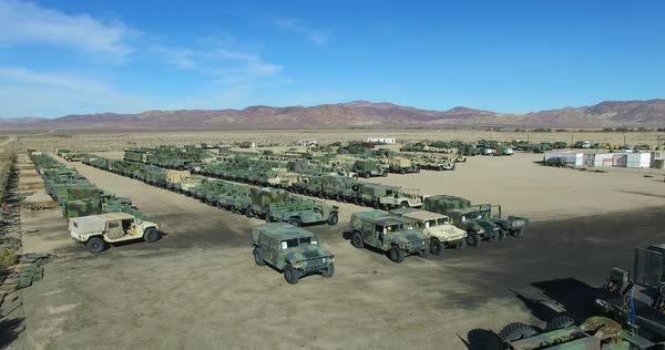 Aerial over a military vehicle storage depot. - 4K Royalty-free Stock ...