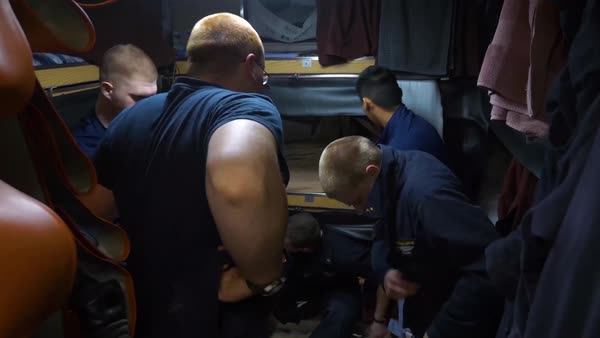 Scenes inside an American nuclear submarine includes sleeping quarters ...
