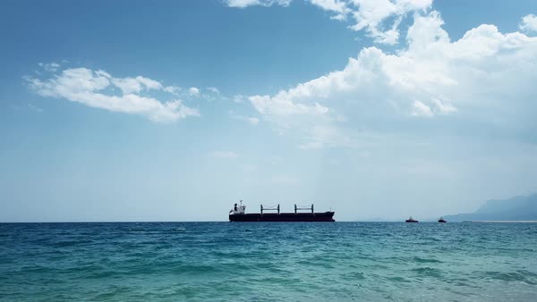 Empty cargo ship tanker , at sea follows in the port. Commercial trade ...