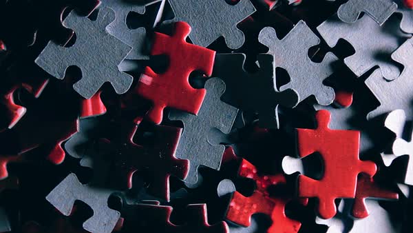 Background of Colored Puzzle Pieces that Slowly Rotating ...