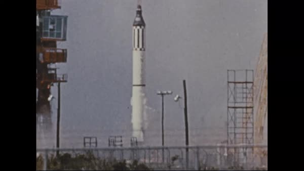 1961 - Alan Shepard is seen in a rocket after it is launched (narrated ...