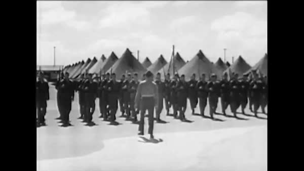 1965 An actor serves as drill sergeant while leading a group of ...