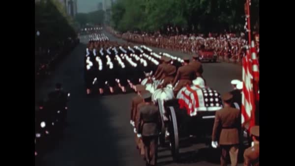 1945 - FDR's casket is pulled by horses in the funeral procession. Men ...