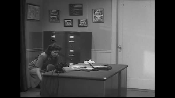 A secretary shows up for the first day at her job and cleans the office ...