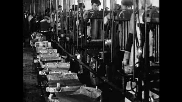 A Ford auto factory assembly line is shown as well as photos of early ...
