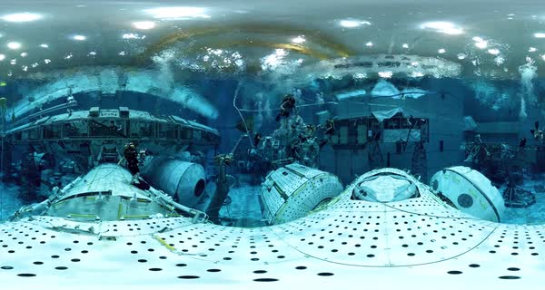 Astronauts train for weightlessness in a pool at NASA Johnson Space ...