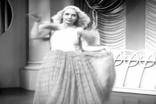 A scantily clad dancer performs a stage dancing screen test in this ...
