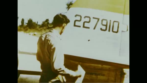1945 - Lieutenant Colonel Gilbert Wymond inspects damage on his ...