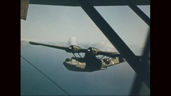 1942 - After the Battle of Midway is over, rescue planes search for ...