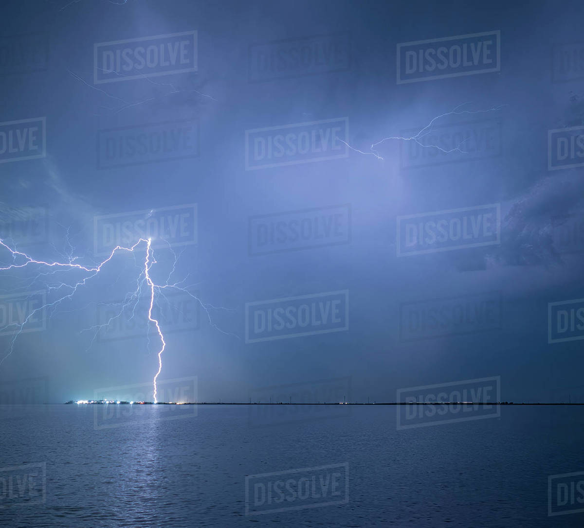 Lightning over water. Electric discharge. Nature background for design ...