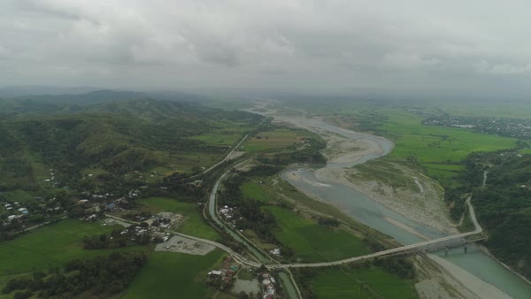 Mountain valley with river, farmland in the Philippines, Luzon. Aerial ...
